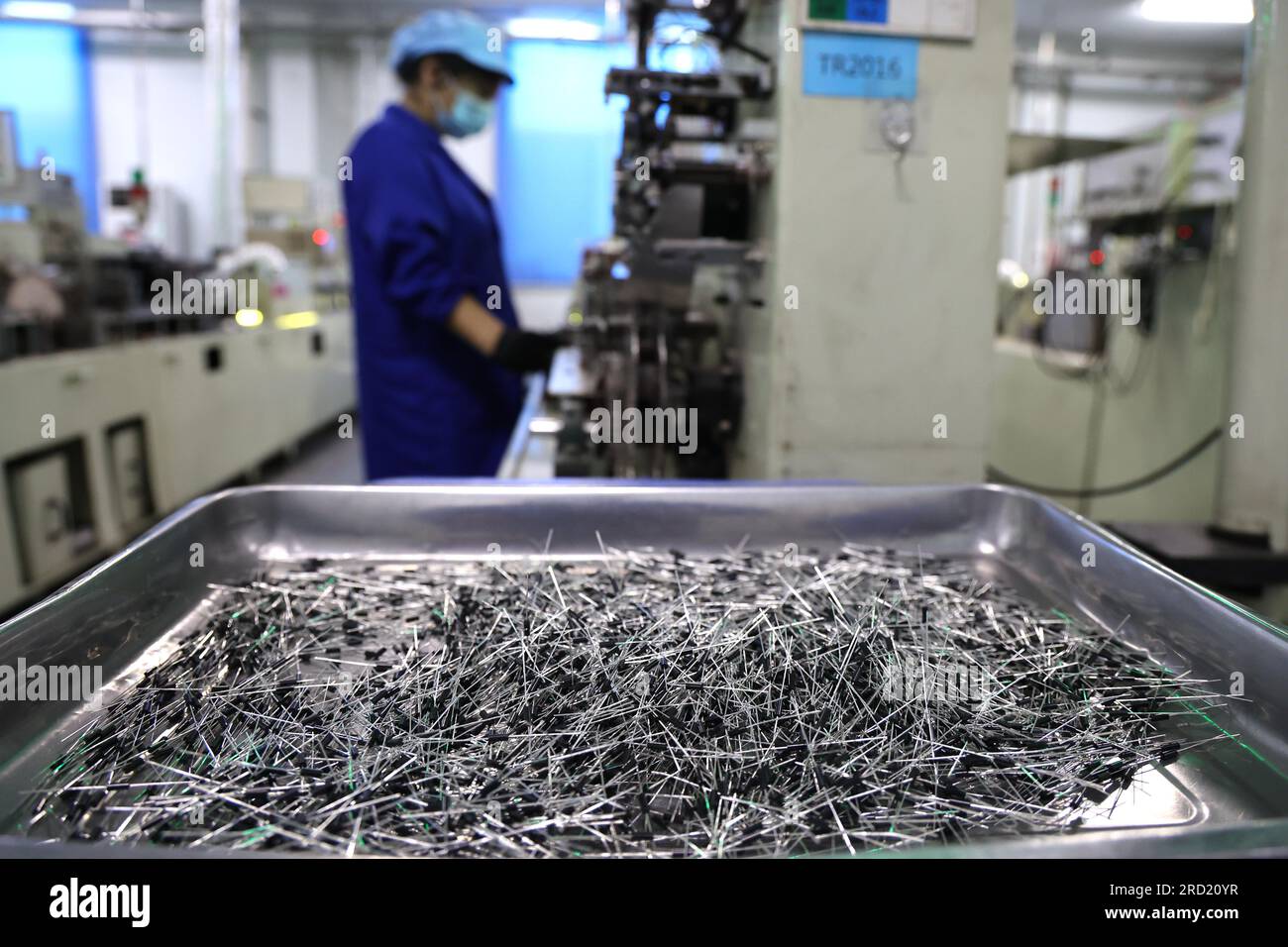 BINZHOU, CHINA - JULY 17, 2023 - A worker produces high-voltage silicon ...