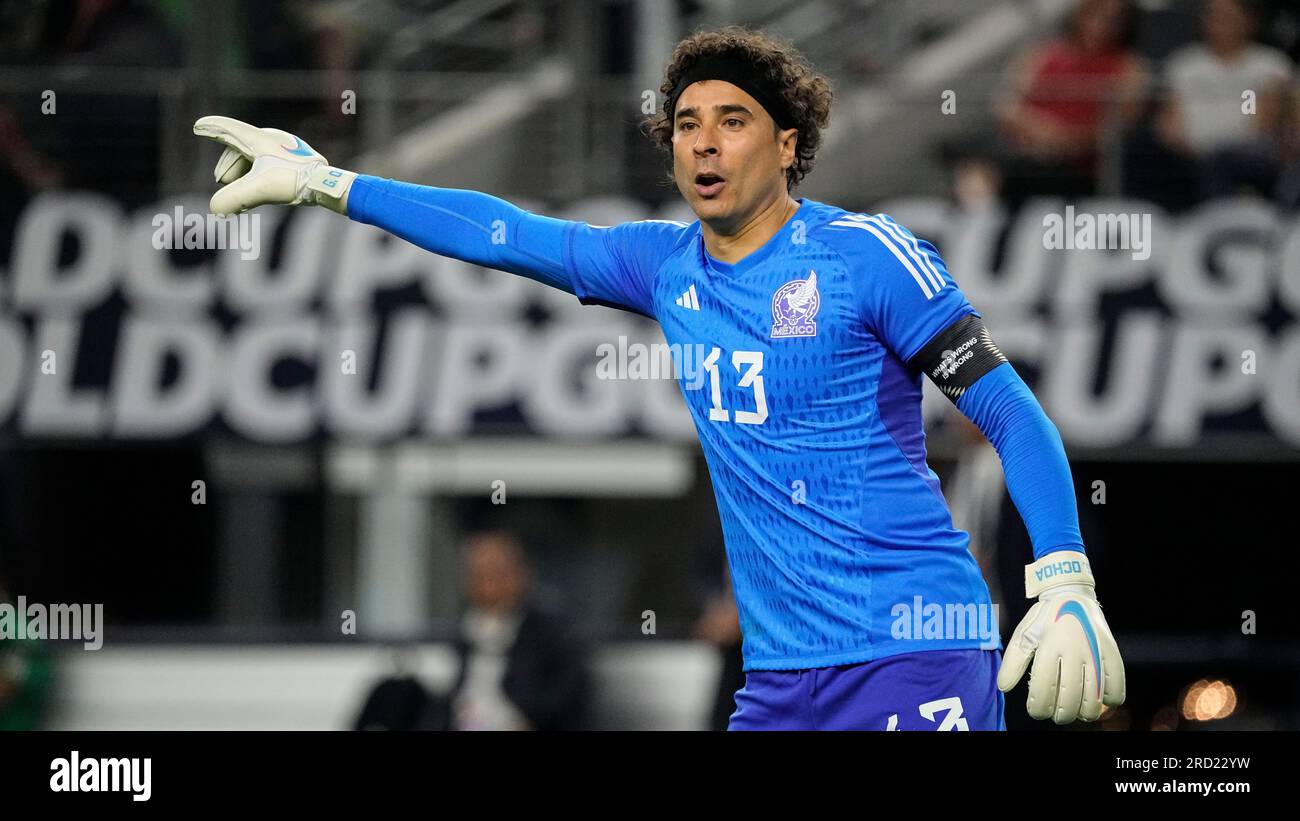 Mexico goalkeeper Guillermo Ochoa (13) gives instructions to his team ...
