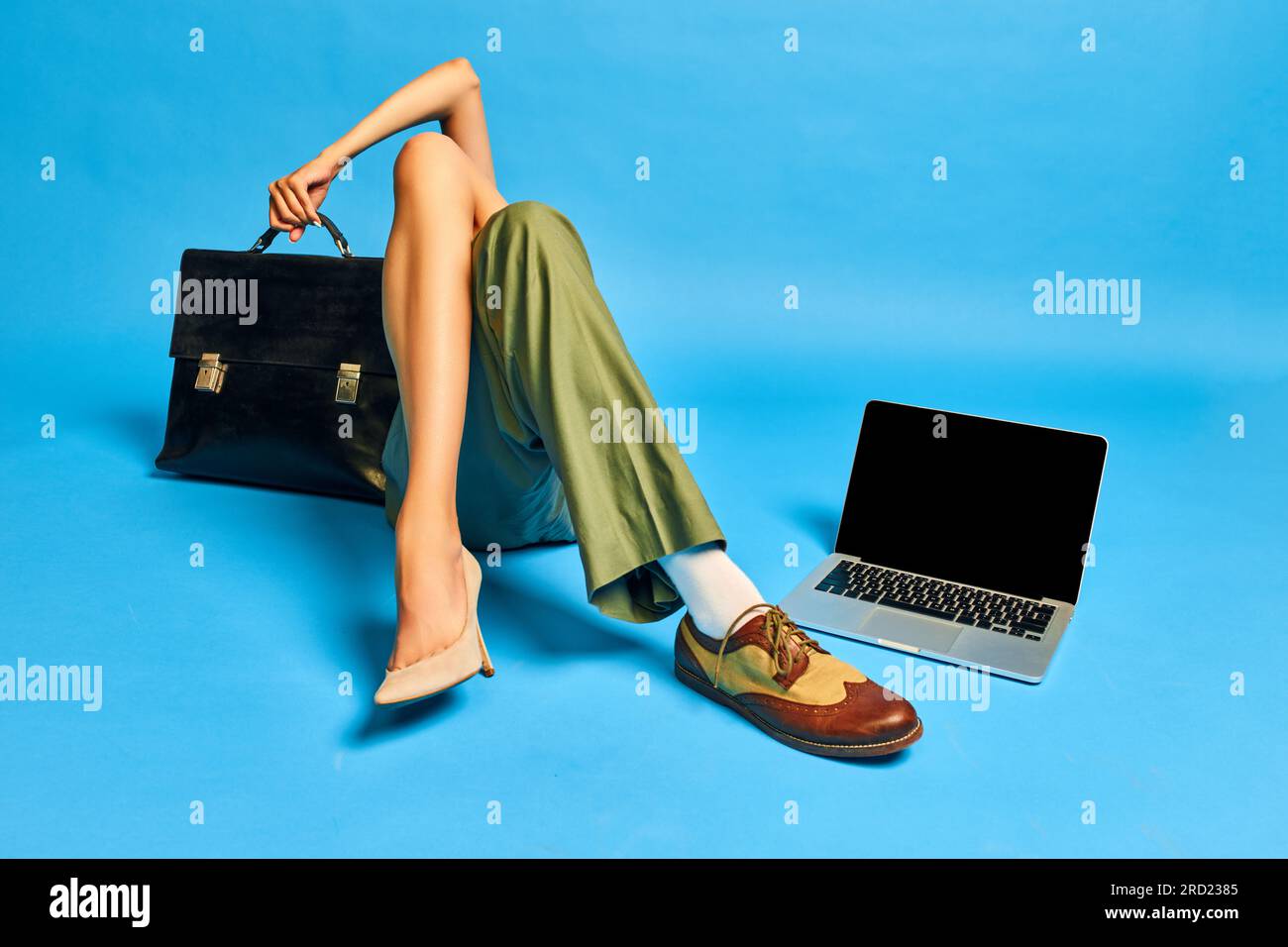 Teamwork. Male and female body parts. Legs in boots and heels with ...