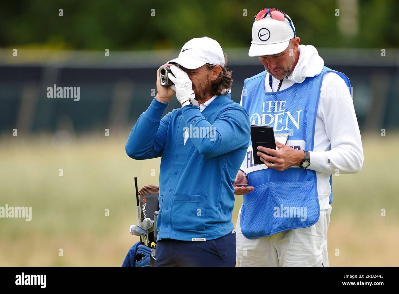 England's Tommy Fleetwood (left) and caddie Ian Finnis on the 2nd ...