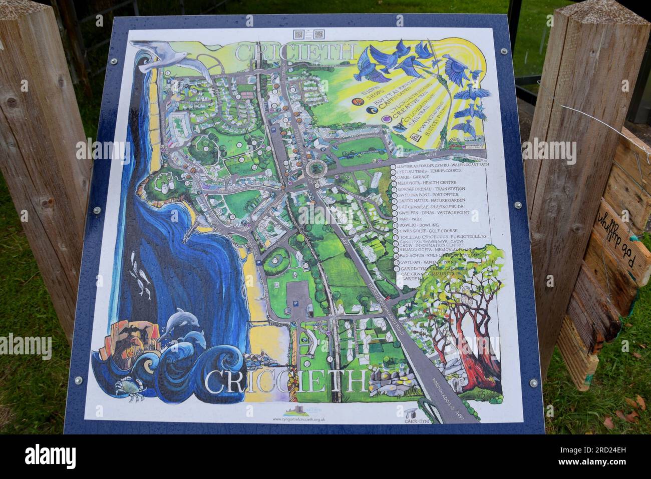 A hand painted map welcoming visitors to the seaside town of Criccieth ...