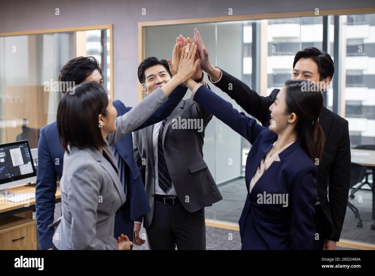 Chinese business people cheering hi-res stock photography and images ...