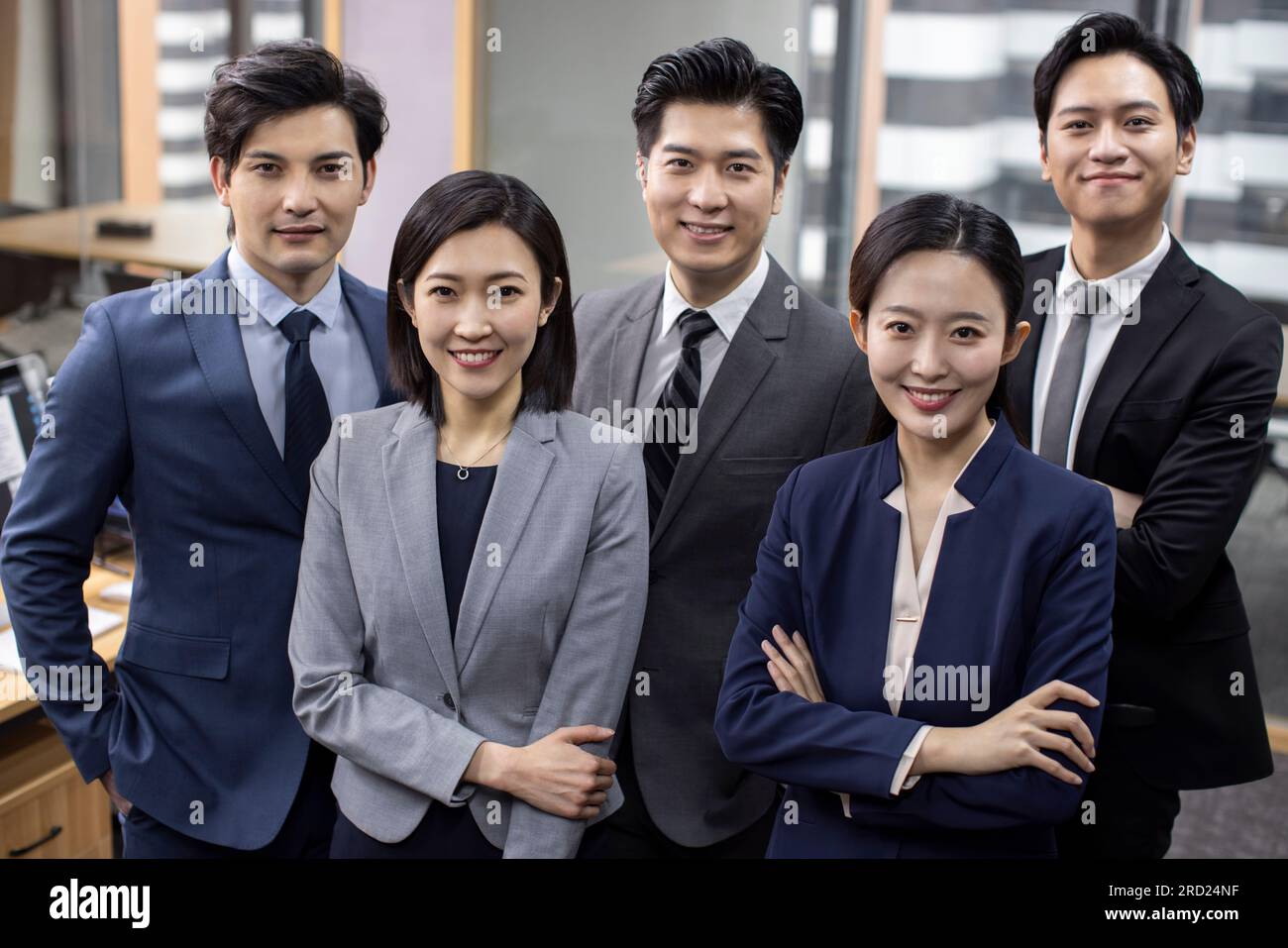 Portrait of confident Chinese business people Stock Photo - Alamy