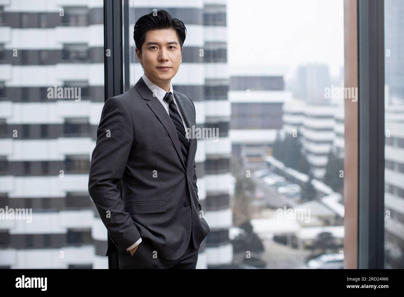 Portrait of confident Chinese businessman Stock Photo - Alamy