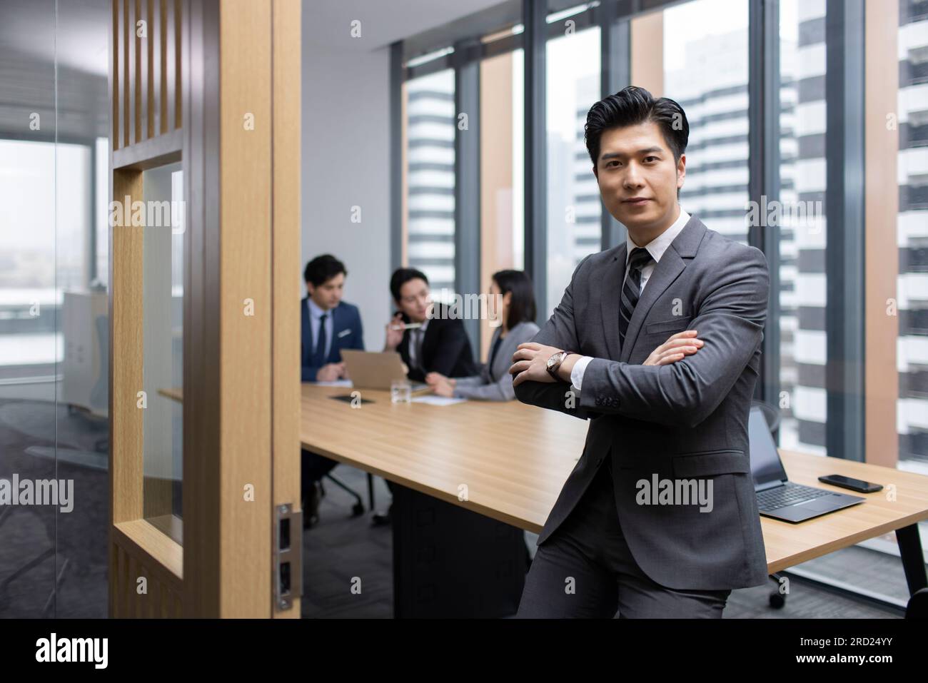 Portrait of confident Chinese businessman Stock Photo - Alamy