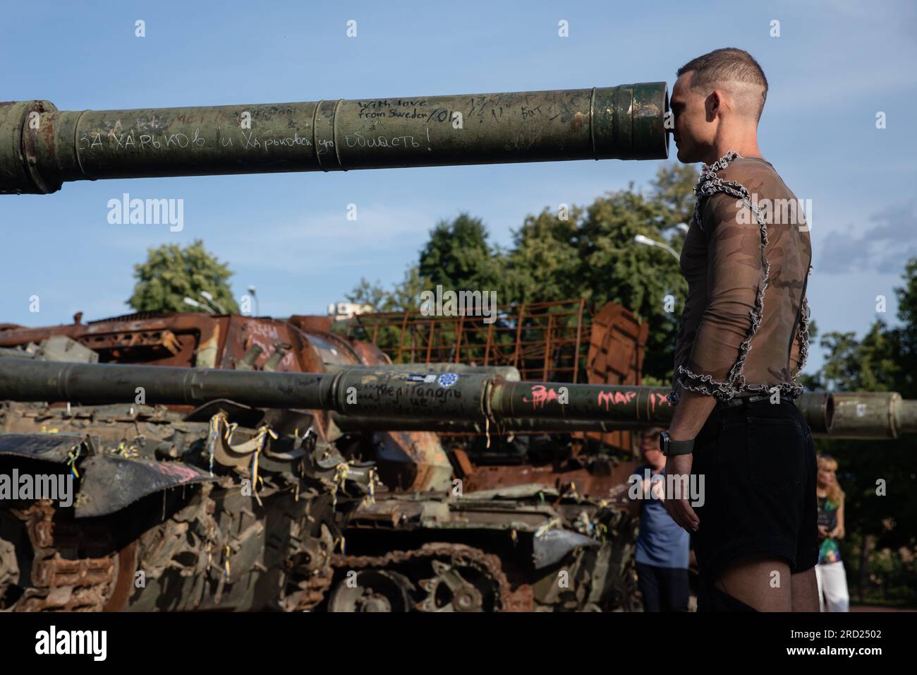 KYIV, UKRAINE - Jul. 25, 2023: Tourist looking inside barrel of a ...
