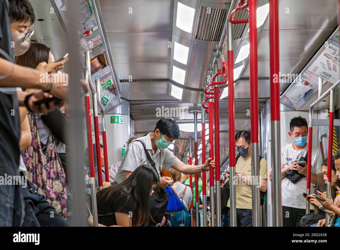 Passengers on MTR rapid transit train, Hong Kong, SAR, China Stock ...