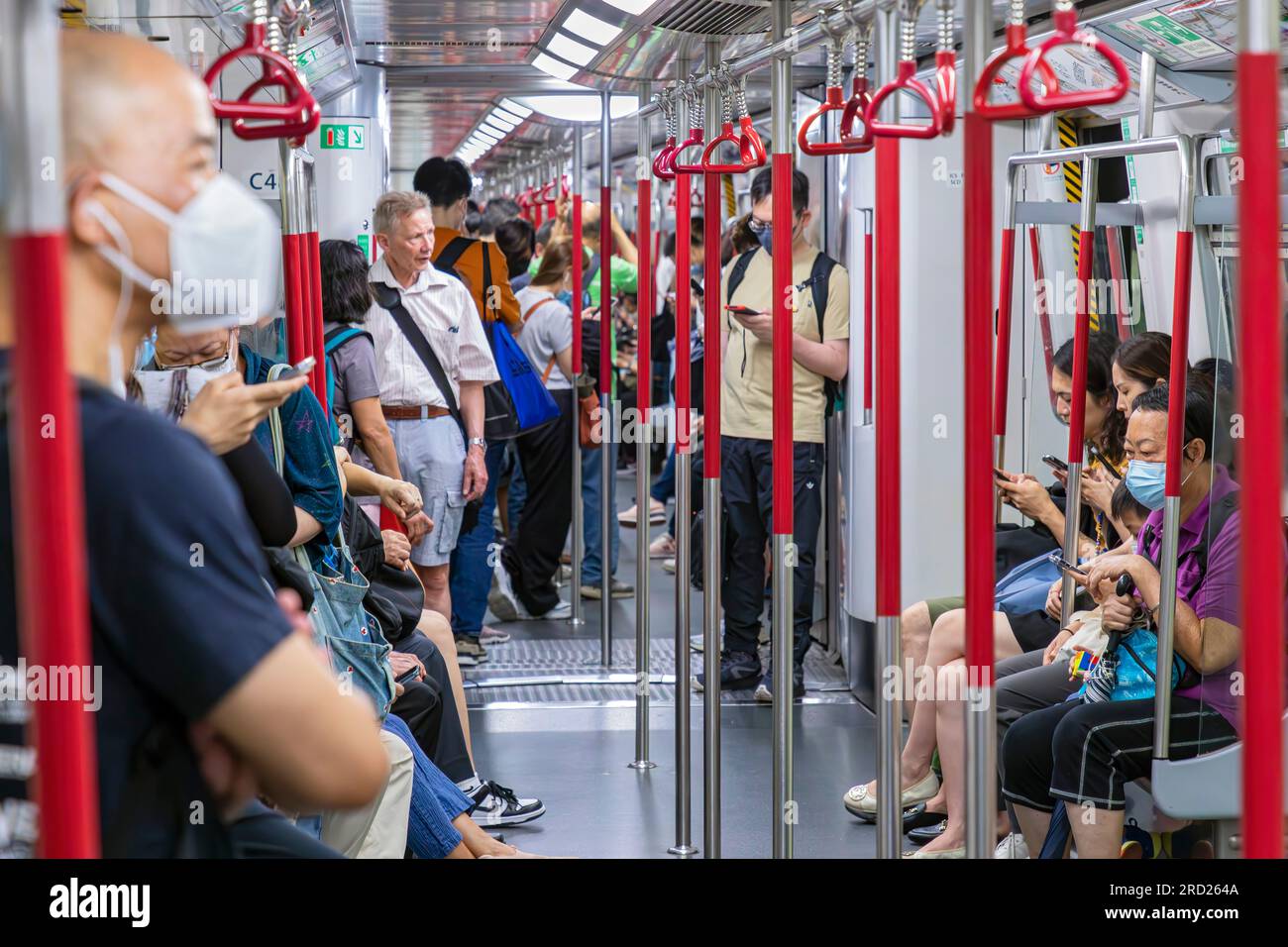 Passengers on MTR rapid transit train, Hong Kong, SAR, China Stock ...