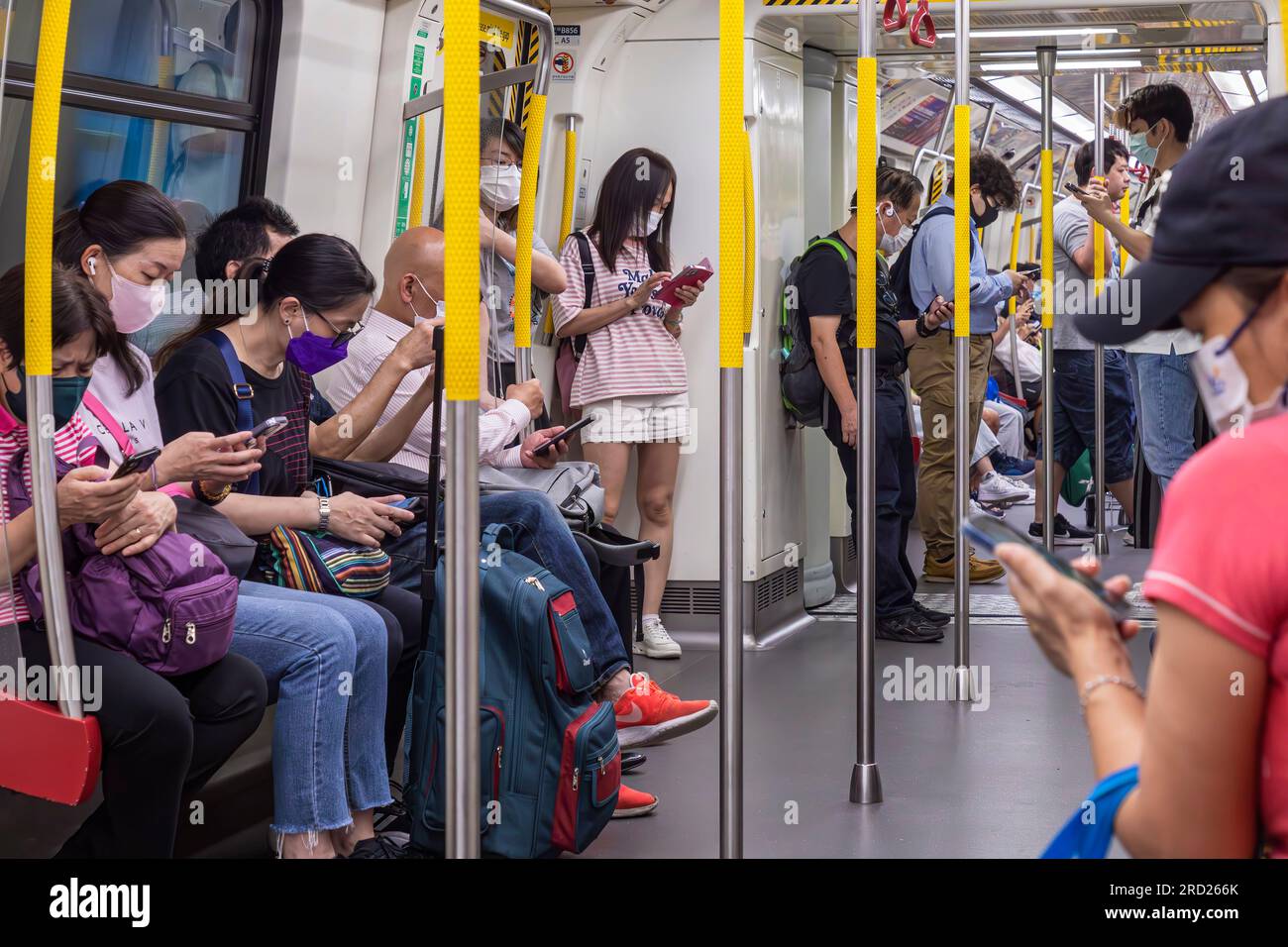 Passengers on MTR rapid transit train, Hong Kong, SAR, China Stock ...