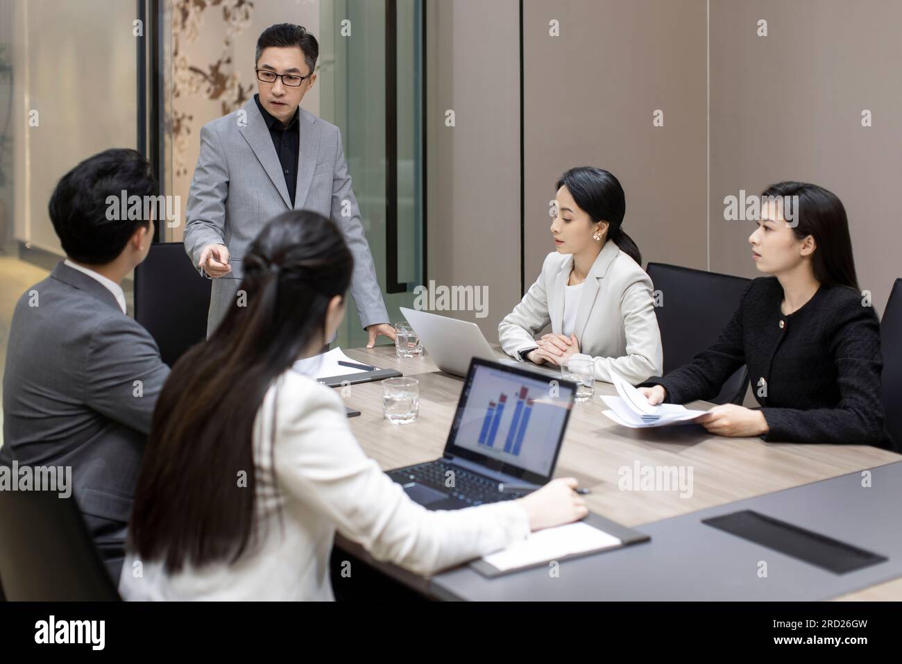 Authority sitting communication pointing face to face hi-res stock ...