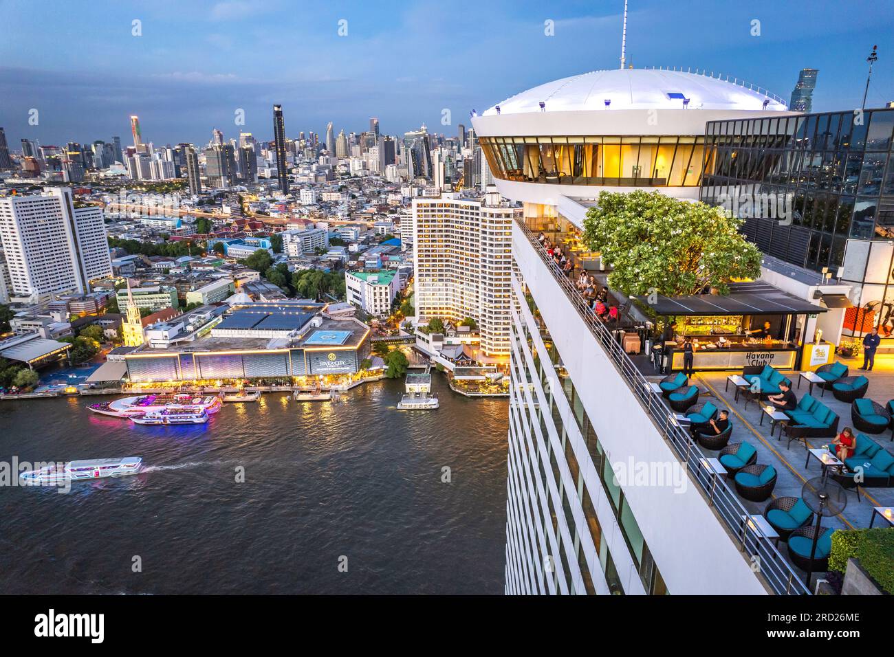 Aerial view of rooftop bar in Khlong San and Chao Phraya river in ...