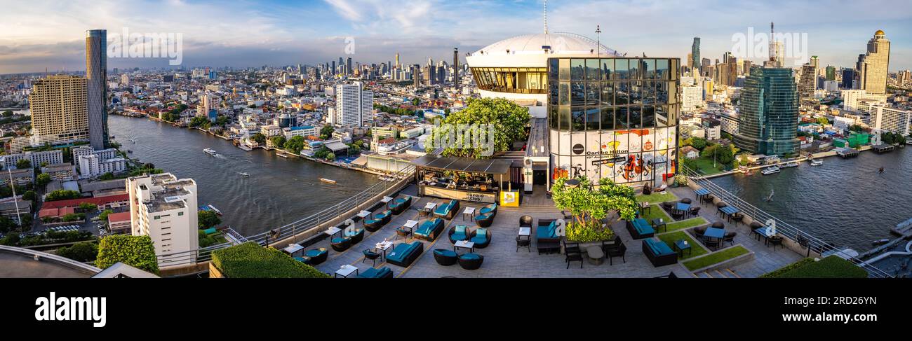 Aerial view of rooftop bar in Khlong San and Chao Phraya river in ...