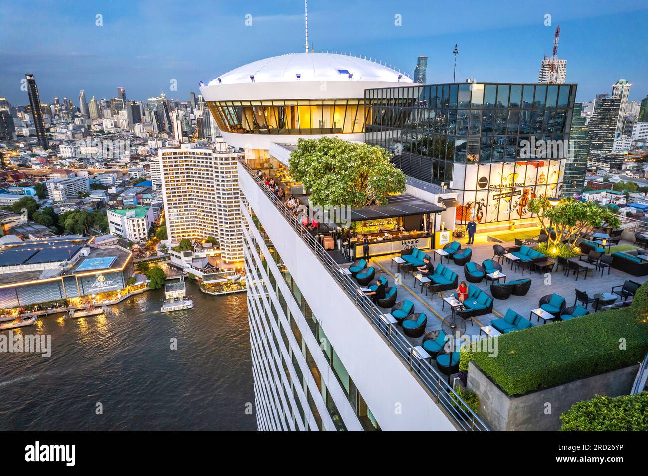 Aerial view of rooftop bar in Khlong San and Chao Phraya river in ...