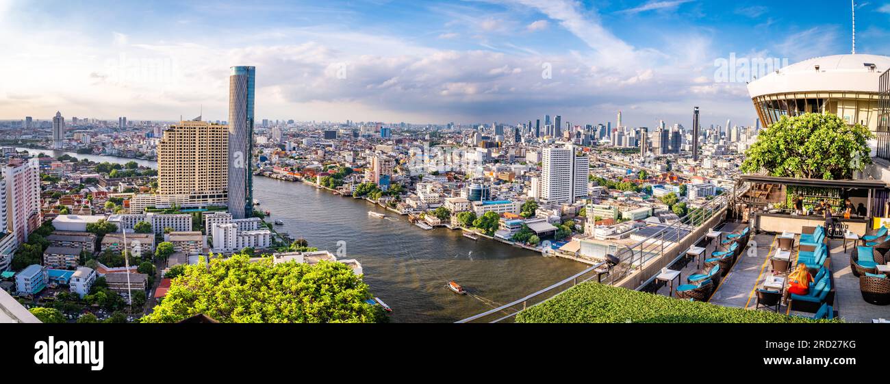 View of rooftop bar in Khlong San and Chao Phraya river in Bangkok ...