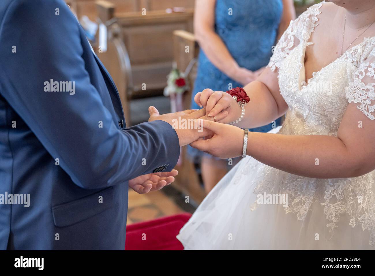 wedding rings and hands of bride and groom ring exchange couple at ...