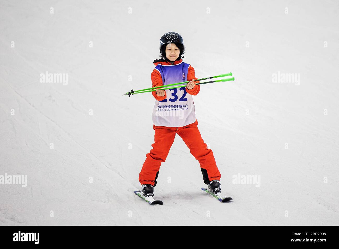A child enjoys skiing at an indoor ski resort as part of the WS Hot ...