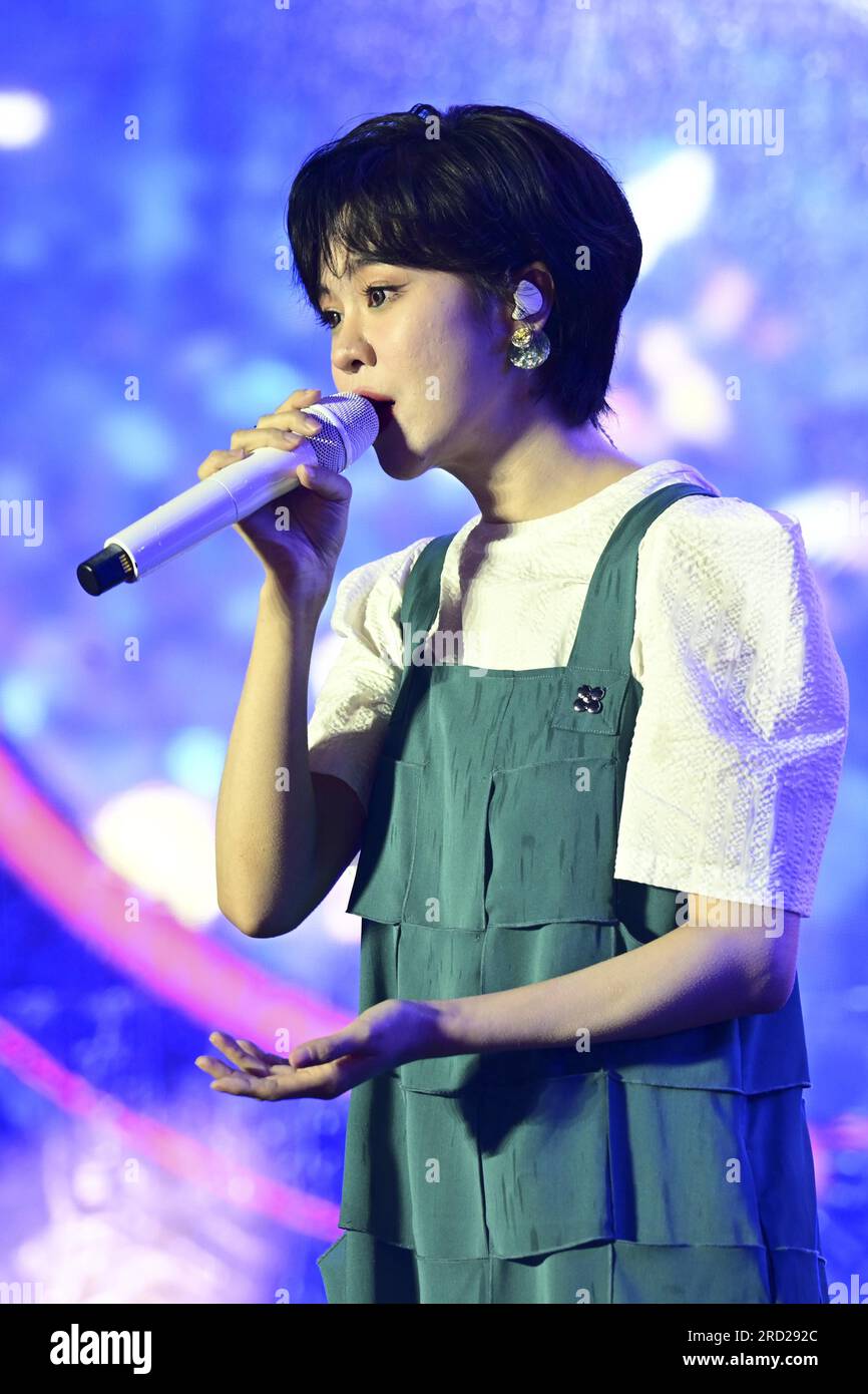 Chinese singer Yisa Yu performs at a beer music festival in Suzhou City ...