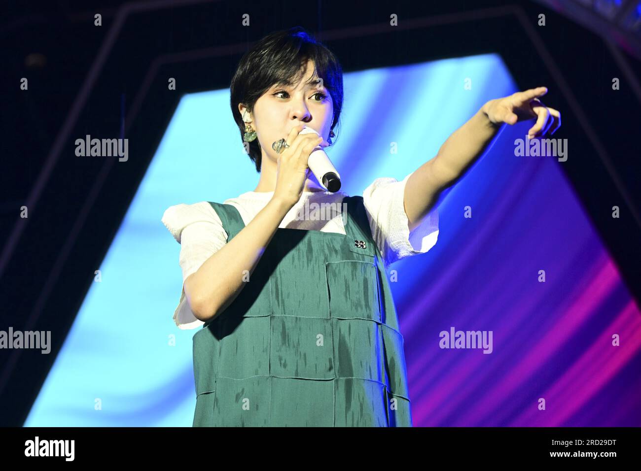 Chinese singer Yisa Yu performs at a beer music festival in Suzhou City ...