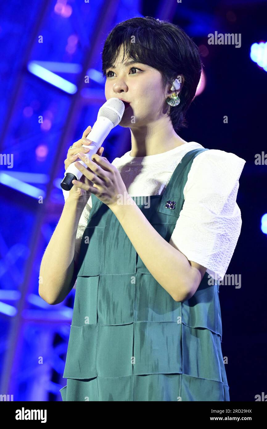 Chinese singer Yisa Yu performs at a beer music festival in Suzhou City ...