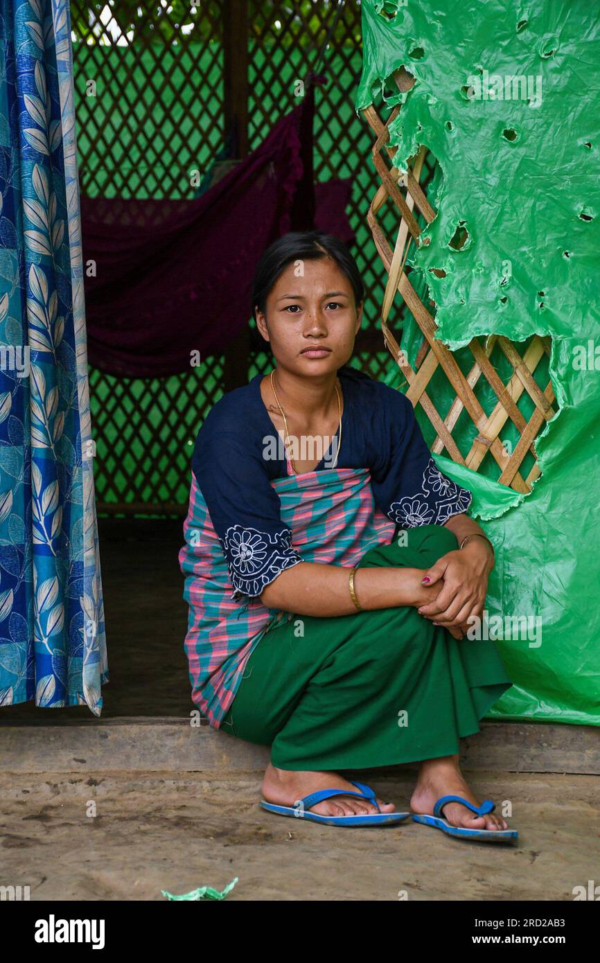 Imphal, India. 15th July, 2023. Saya, 25, from Nongshum village, who is ...
