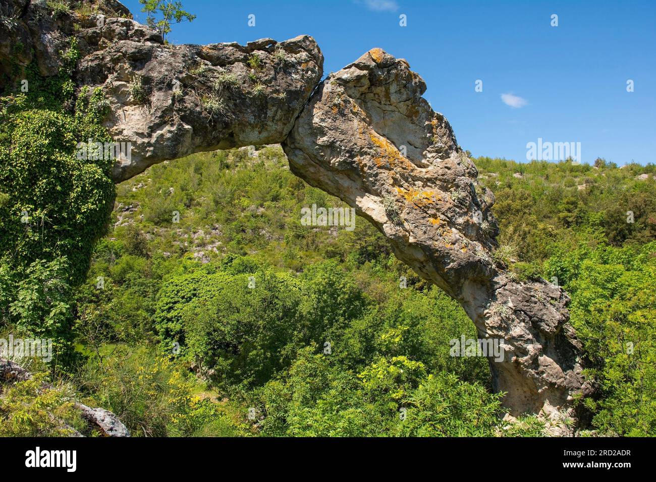 Kolac Rock Arch near Nerezisca on Brac Island, Croatia. A result of a ...