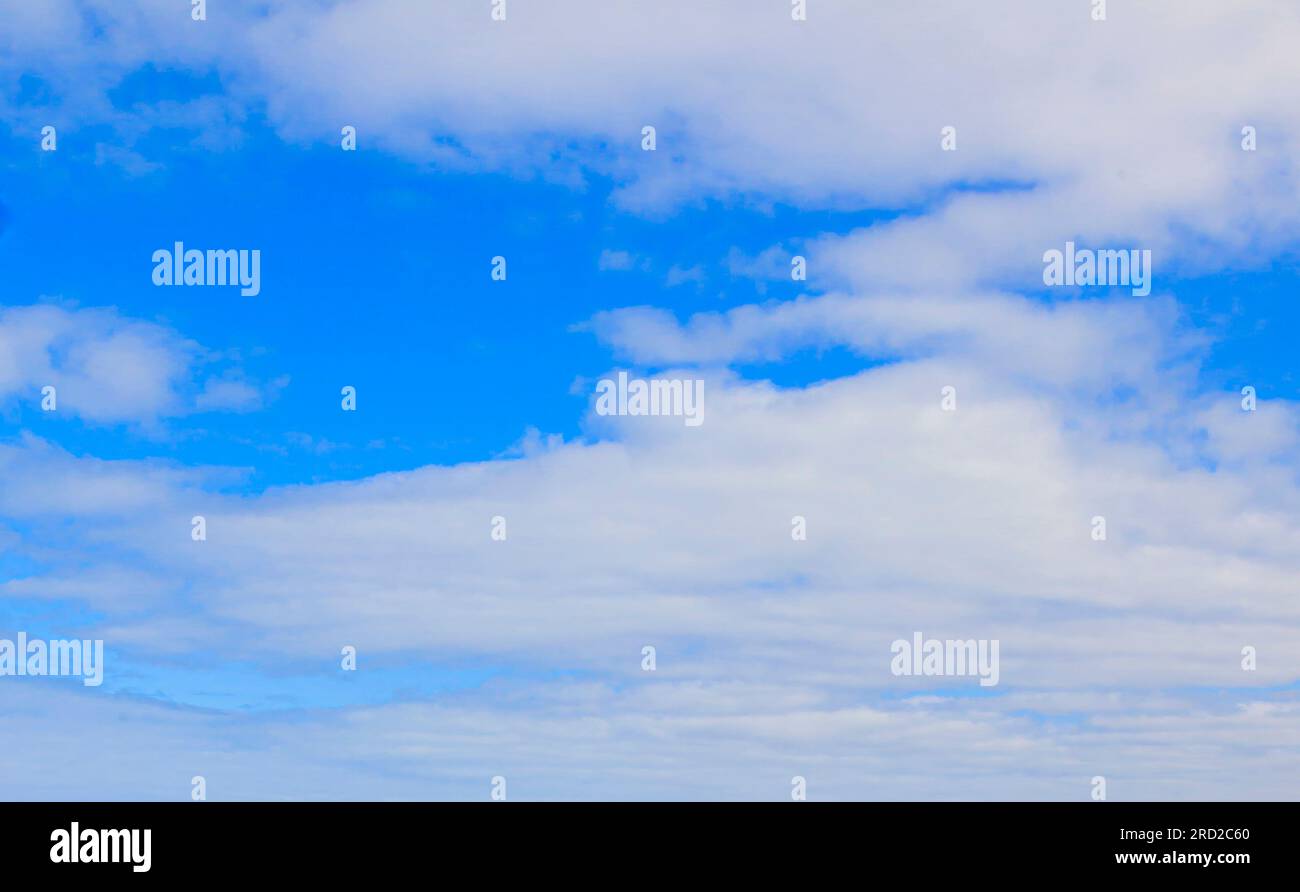 Image of a partly cloudy and partly clear sky during the day without ...