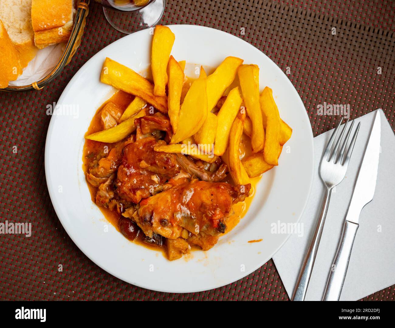 Dish of stewed rabbit and potatoes Stock Photo - Alamy