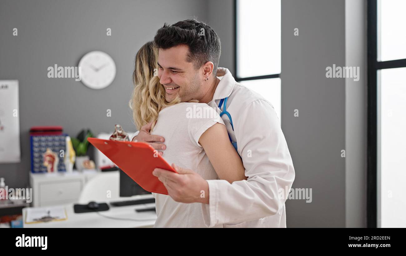 Man woman doctor patient hugging hi-res stock photography and images ...