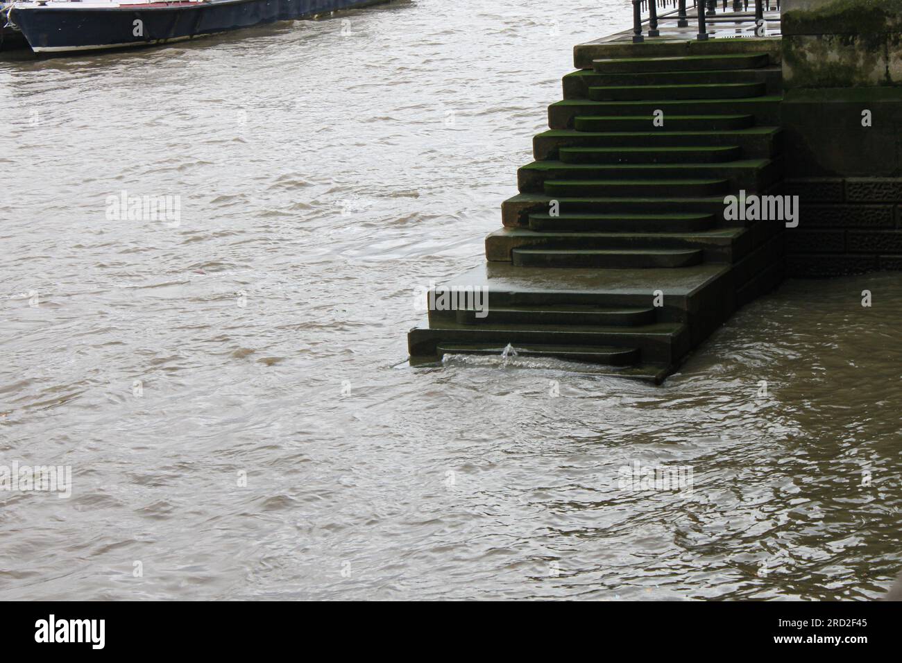 A stone staircase leading down to water Stock Photo - Alamy