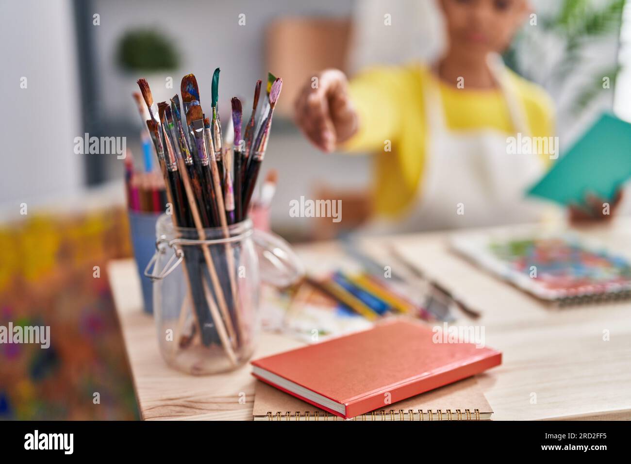African american reading painting hi-res stock photography and images ...