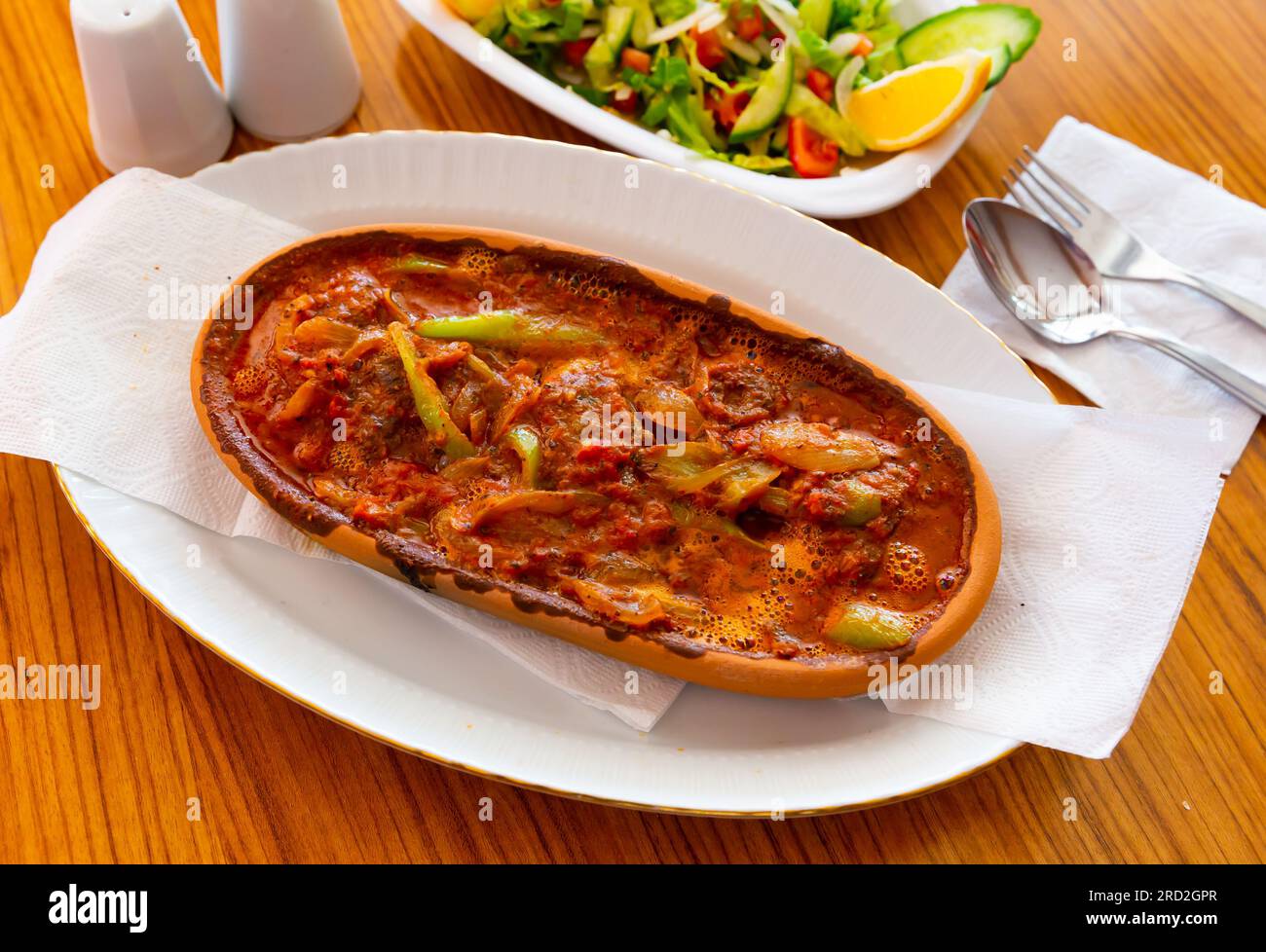 Izmir kofte, turkish dish of spicy meatballs Stock Photo - Alamy
