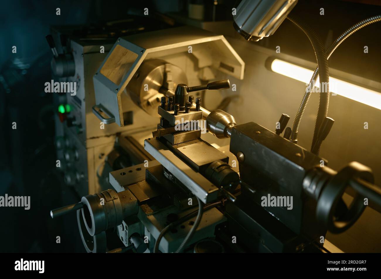 Professional lathe turning machine at garage workshop Stock Photo - Alamy