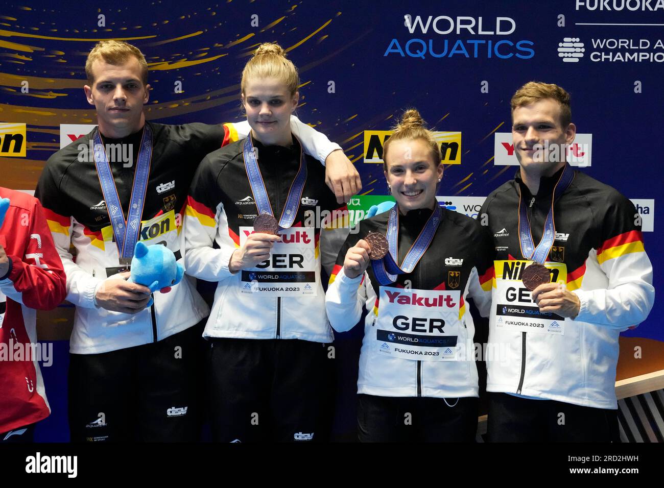 Team Germany celebrates with their bronze medals during the podium ...