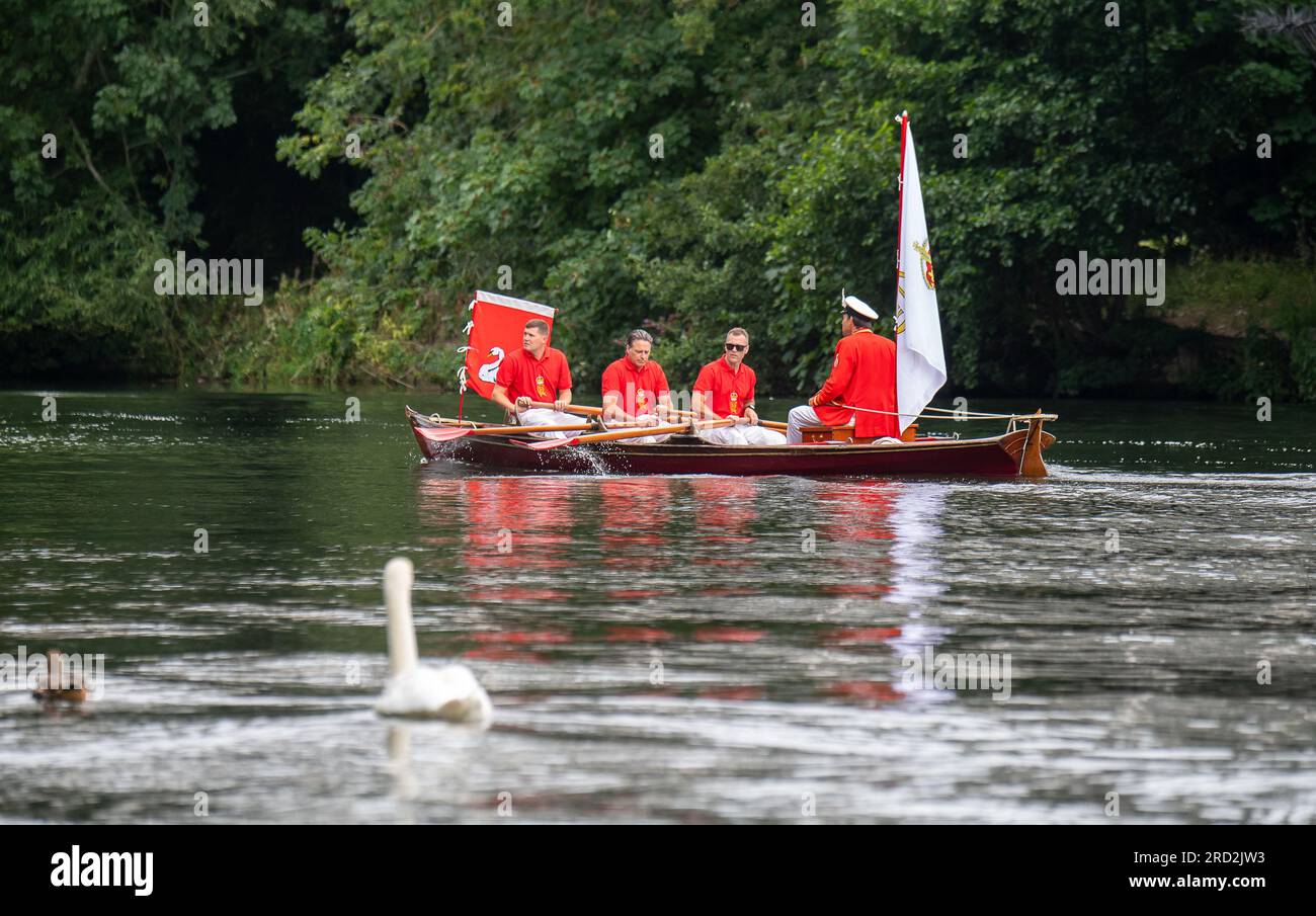 Windsor, Berkshire, UK. 18th July, 2023. Swan Uppers were rowing along ...