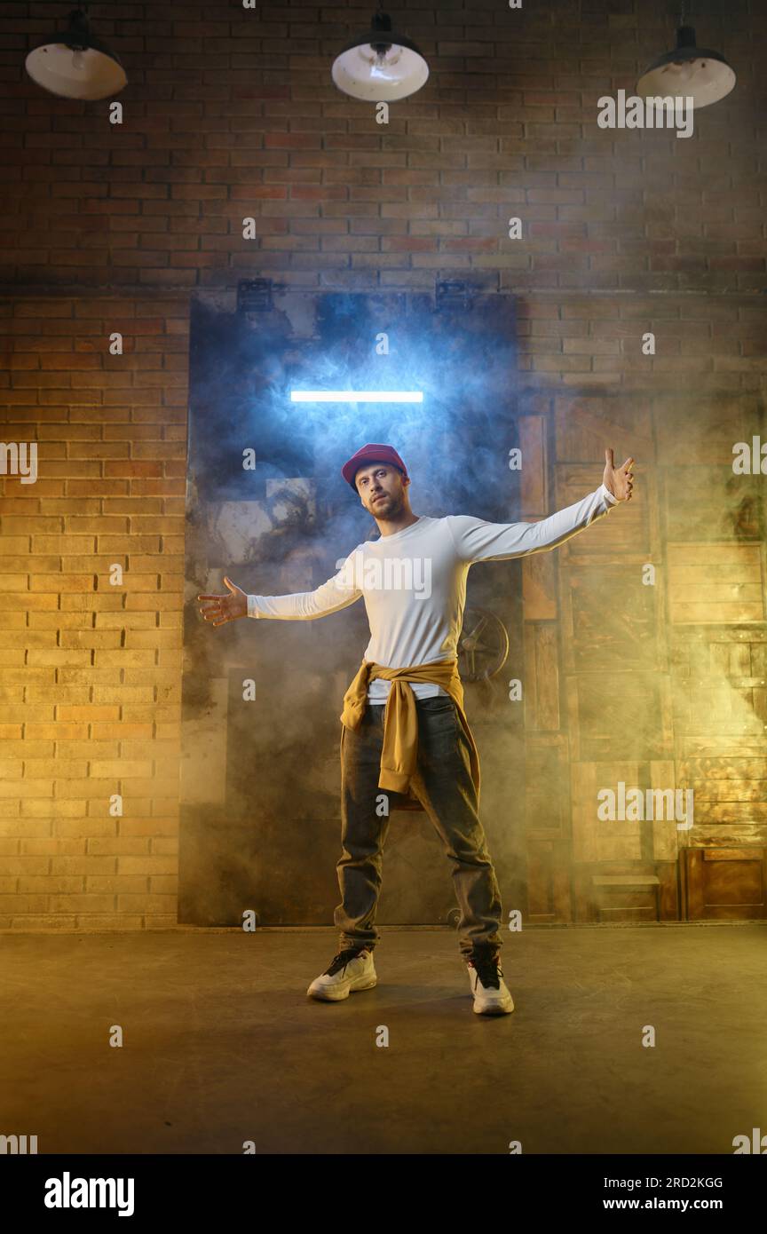 Contemporary hip hop freestyle dancer posing for camera Stock Photo - Alamy
