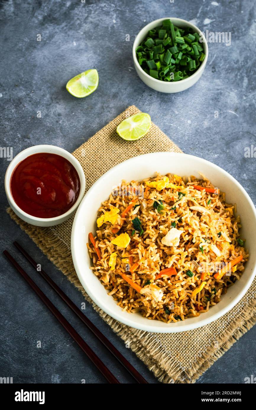 Asian Fried Rice with Condiment on Dark Background Top Down Vertical ...