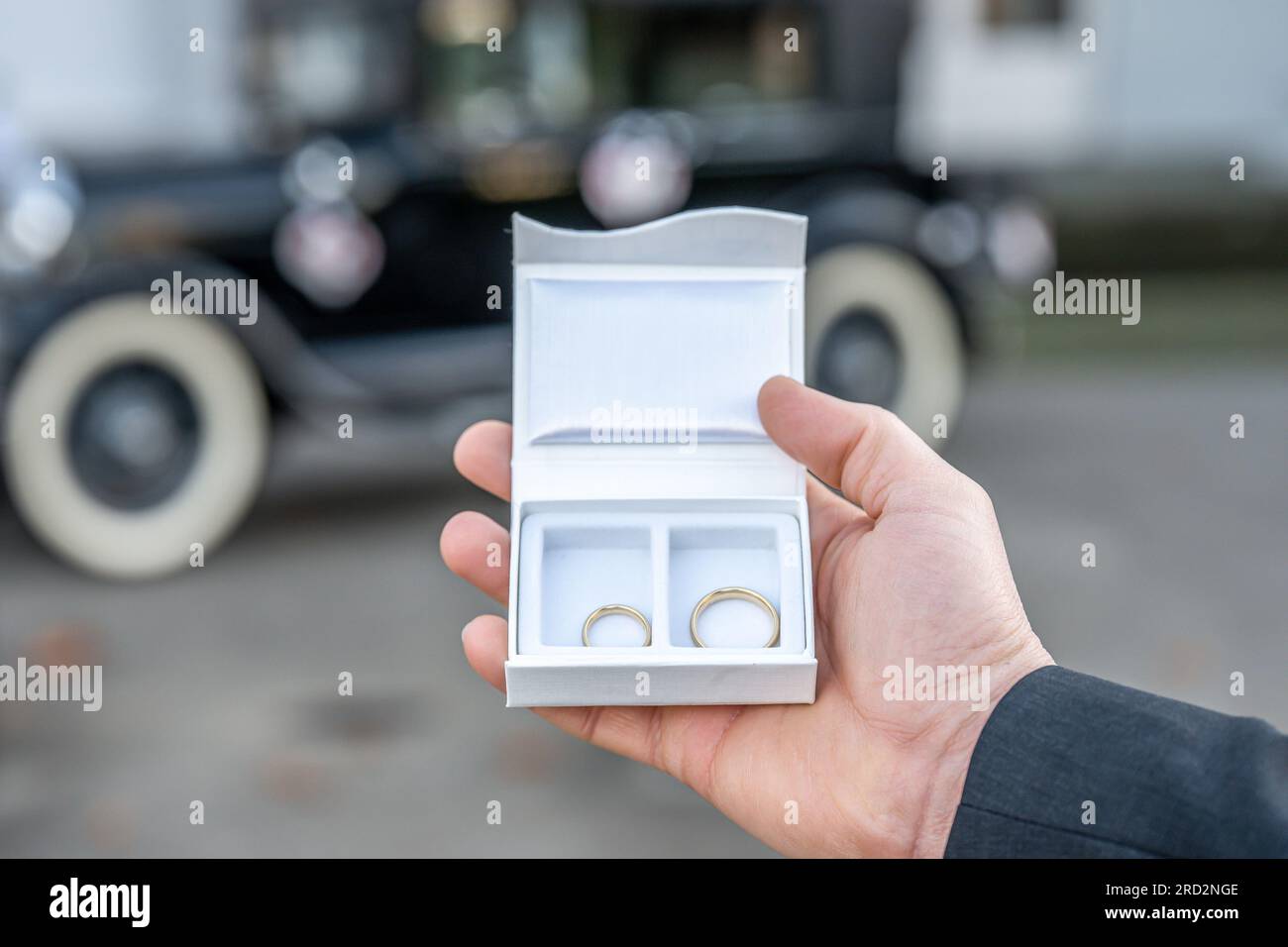 Groom hold in hand Romantic marriage couple wedding Symbols rings in a ...