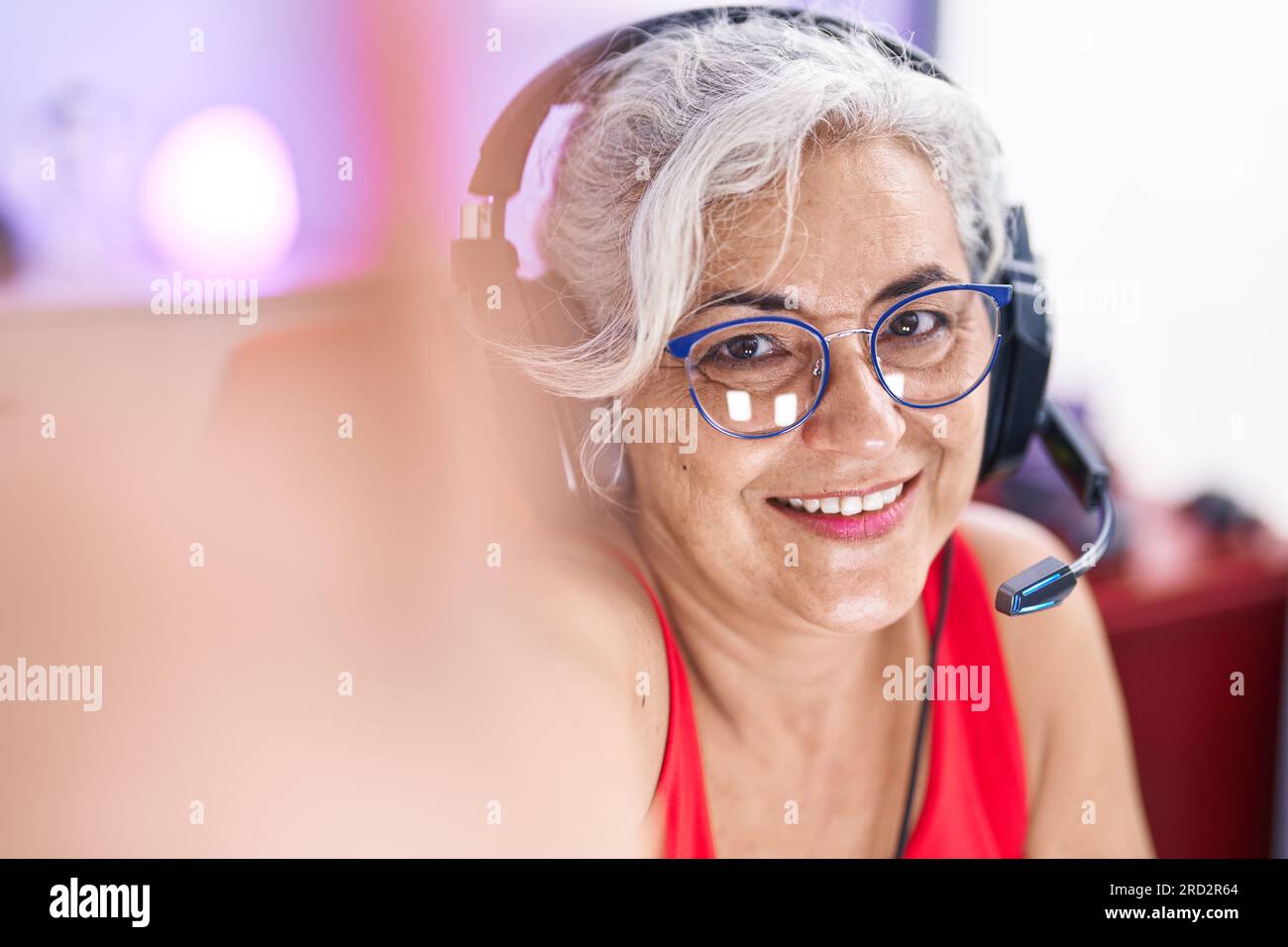 Middle age grey-haired woman streamer smiling confident make selfie by ...