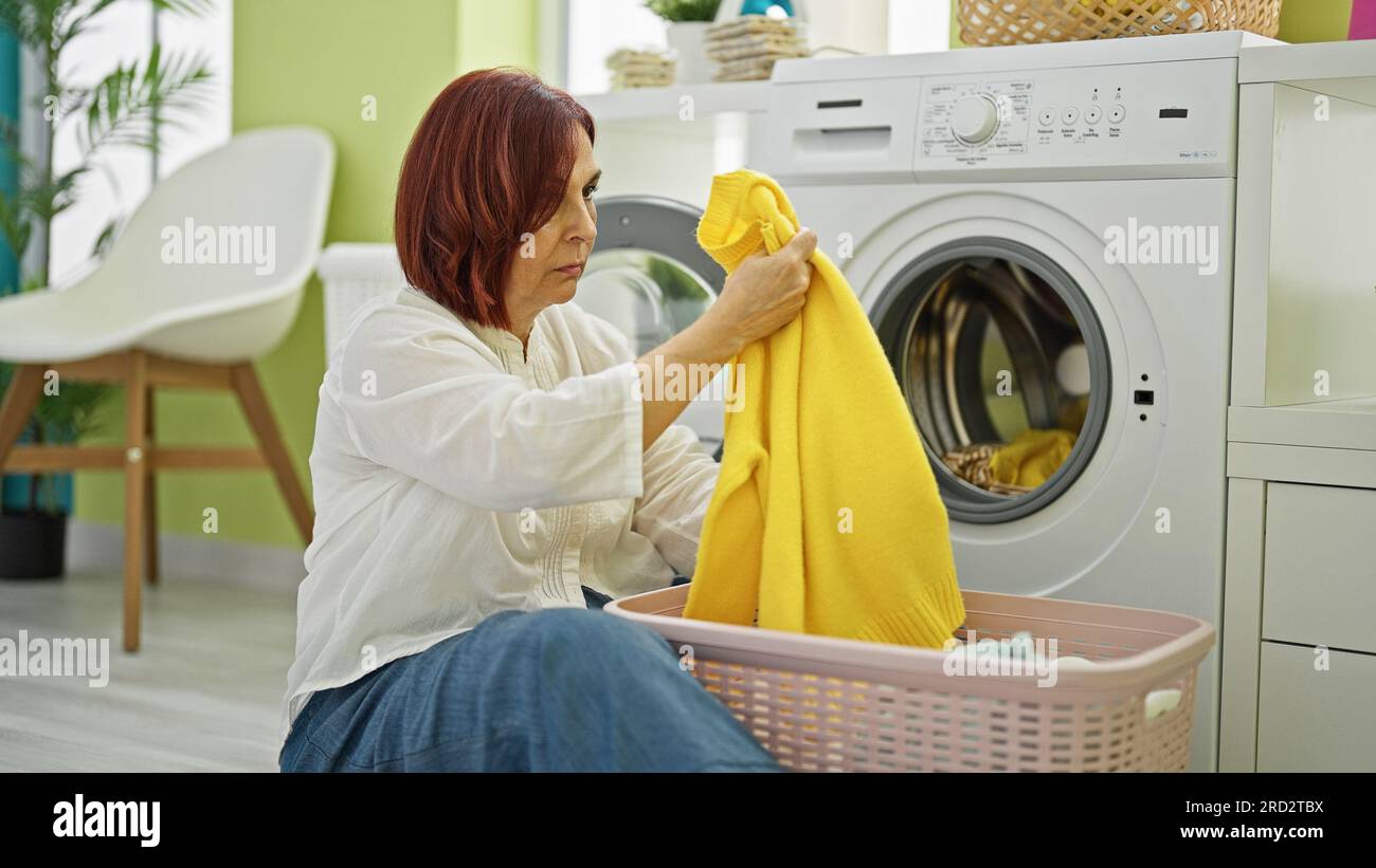 Mature woman washing machine hi-res stock photography and images - Alamy