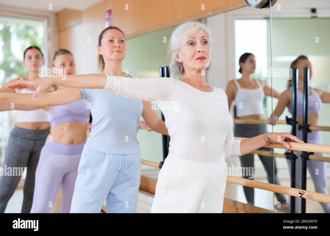Adults learning to dance ballet in dancing school Stock Photo - Alamy