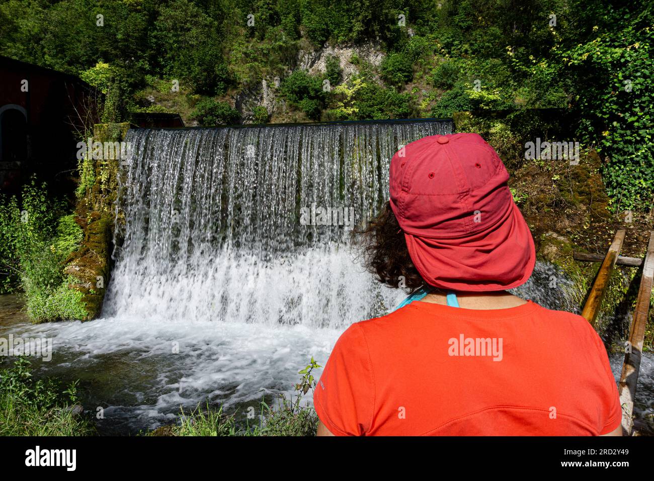 Woman watching waterfall hi-res stock photography and images - Alamy