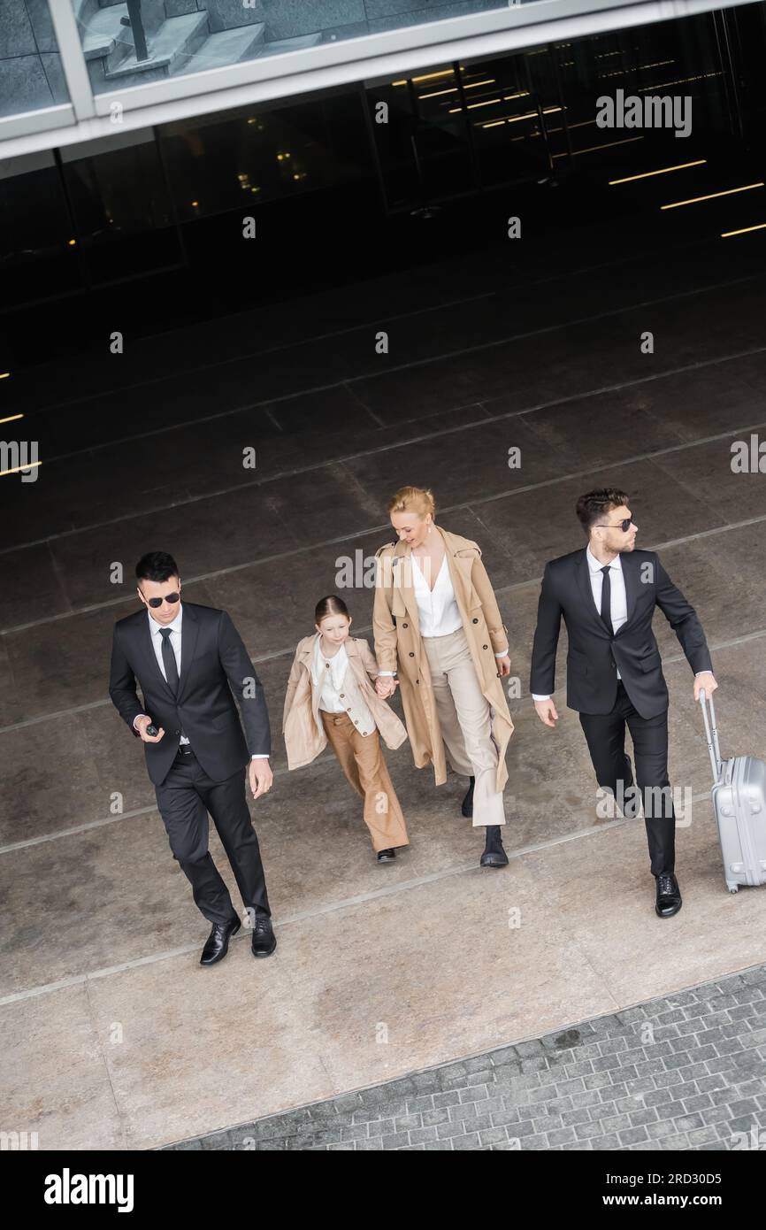 Security guards protecting girl hi-res stock photography and images - Alamy