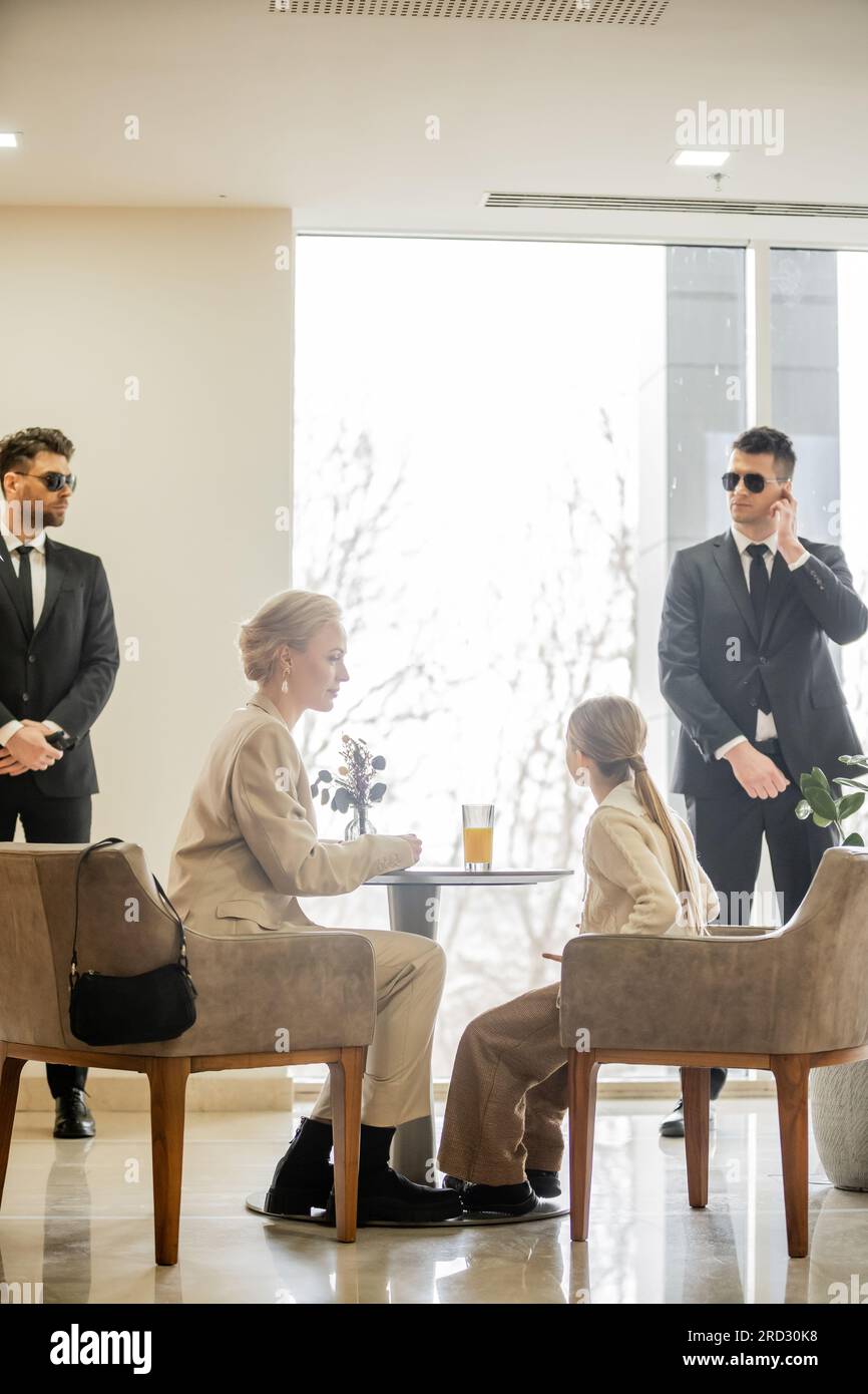 security service, private safety concept, bodyguards standing near ...