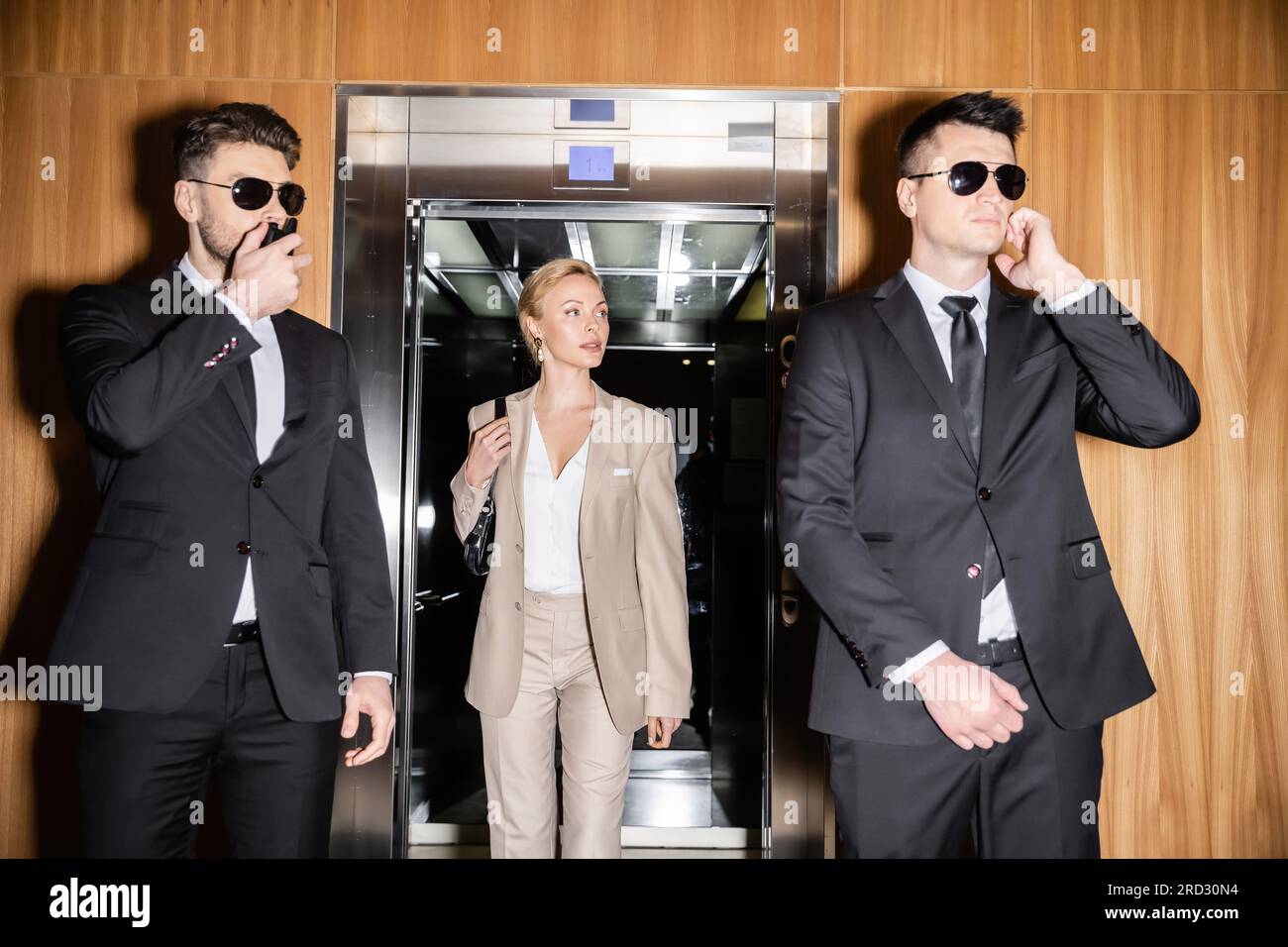 personal security and protection concept, blonde and successful woman ...