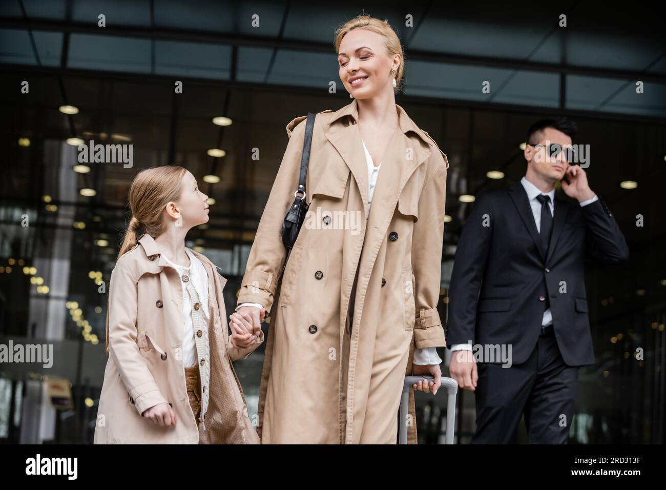 personal security, lifestyle, blonde mother with preteen girl holding ...