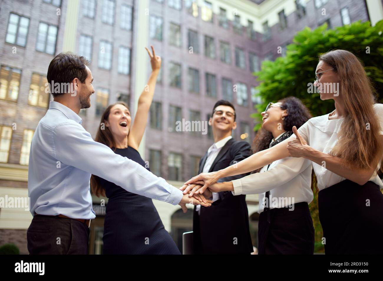 Successful teamwork and connection. Business people holding hands ...