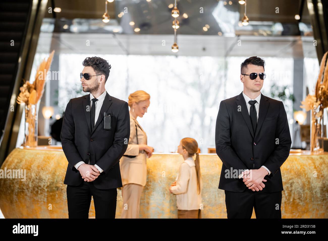 personal security, handsome bodyguards in suits and sunglasses ...