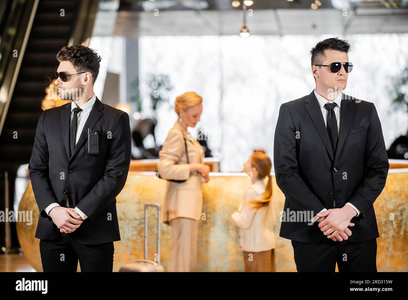 personal security, handsome bodyguards in suits and sunglasses ...