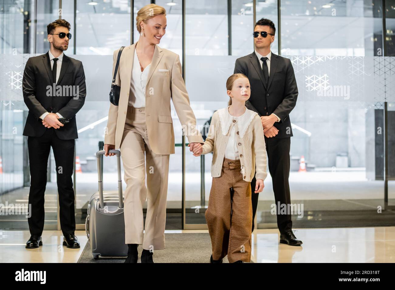 personal security service, two bodyguards in formal wear and sunglasses ...