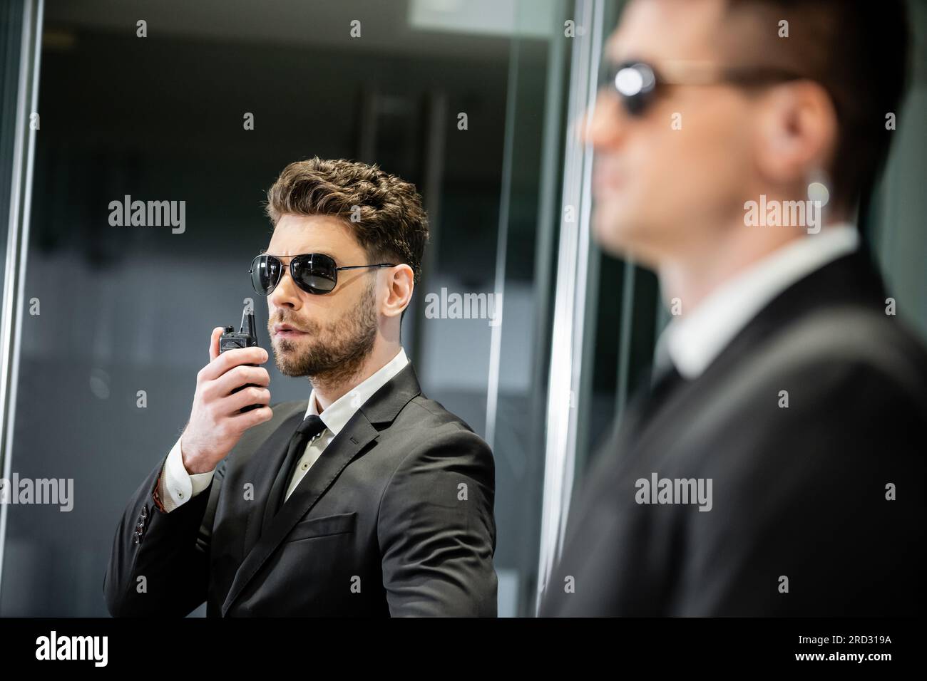 bodyguard service, private security, professionals in suit and ...